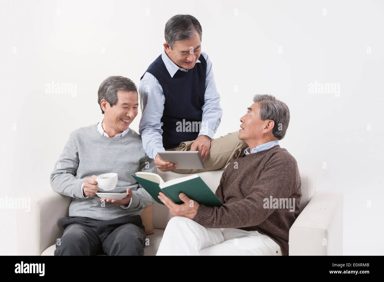 three old men on a couch Stock Photo - Alamy