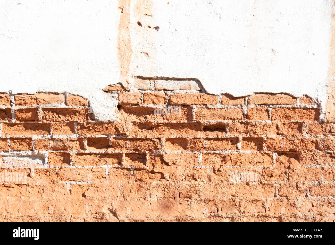 Old brick wall of red brick weathering weathered Stock Photo - Alamy