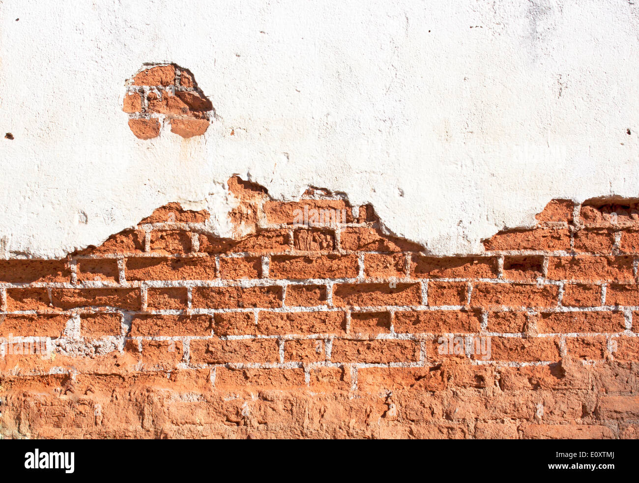 Old brick wall of red brick weathering weathered Stock Photo - Alamy