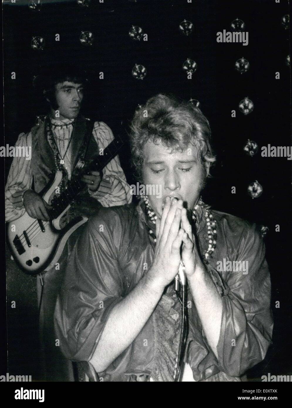 Nov. 15, 1967 - Singer Johnny Halliday performs at sports arena Stock ...