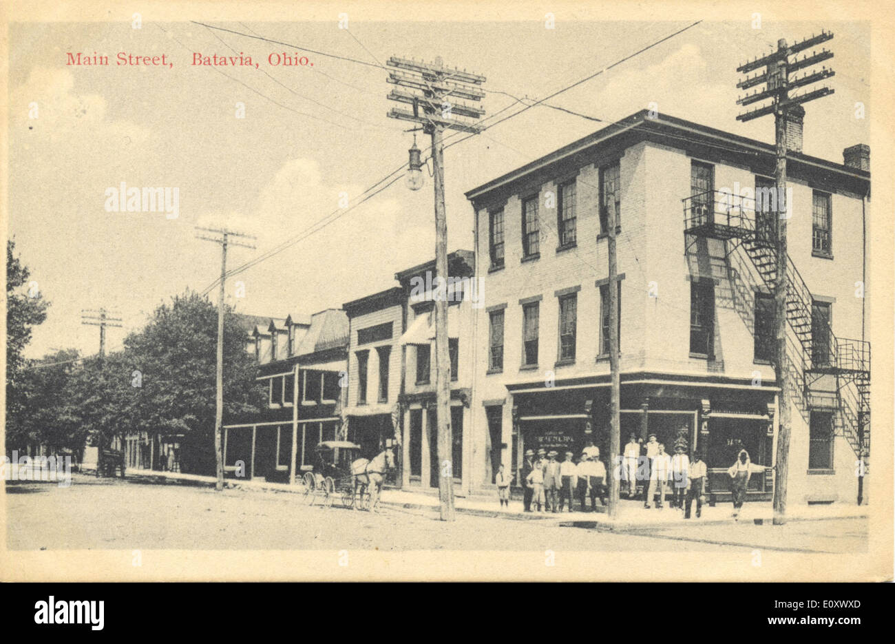 This postcard image depicts Main Street in Batavia, Ohio, capturing the ...