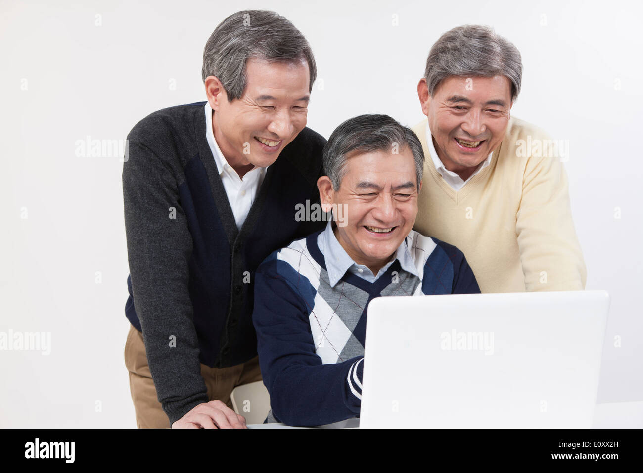 old people working with a laptop Stock Photo - Alamy