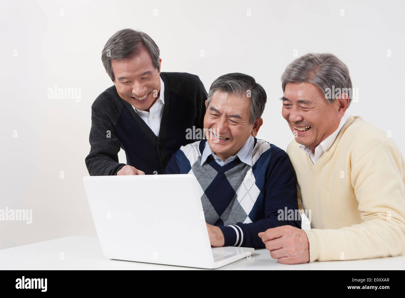 Old people working hi-res stock photography and images - Alamy