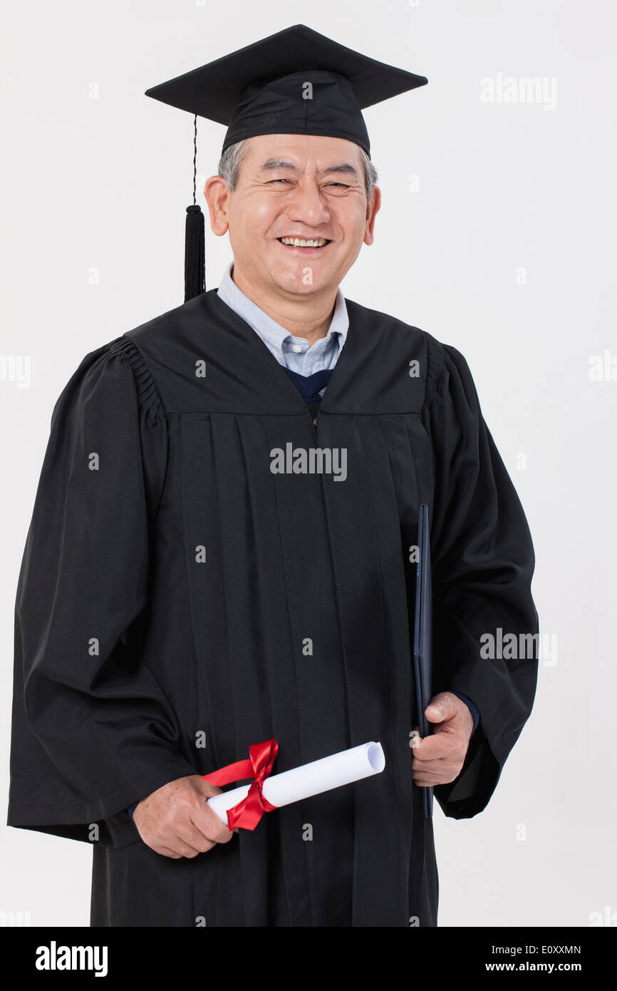 an old man posing in a graduation outfit Stock Photo - Alamy