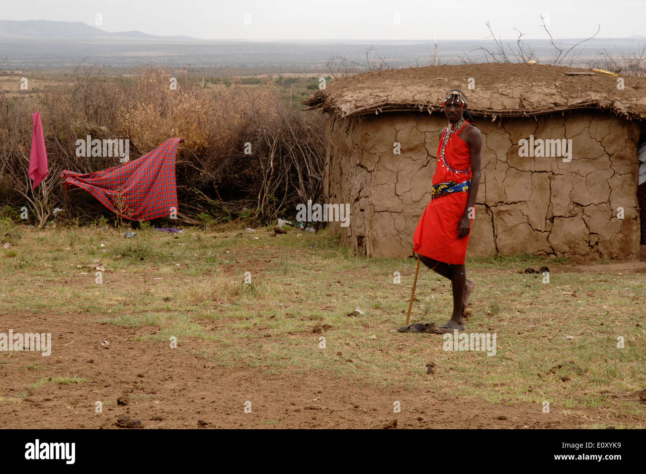 masai maasai warrior posing in front of his home Stock Photo - Alamy