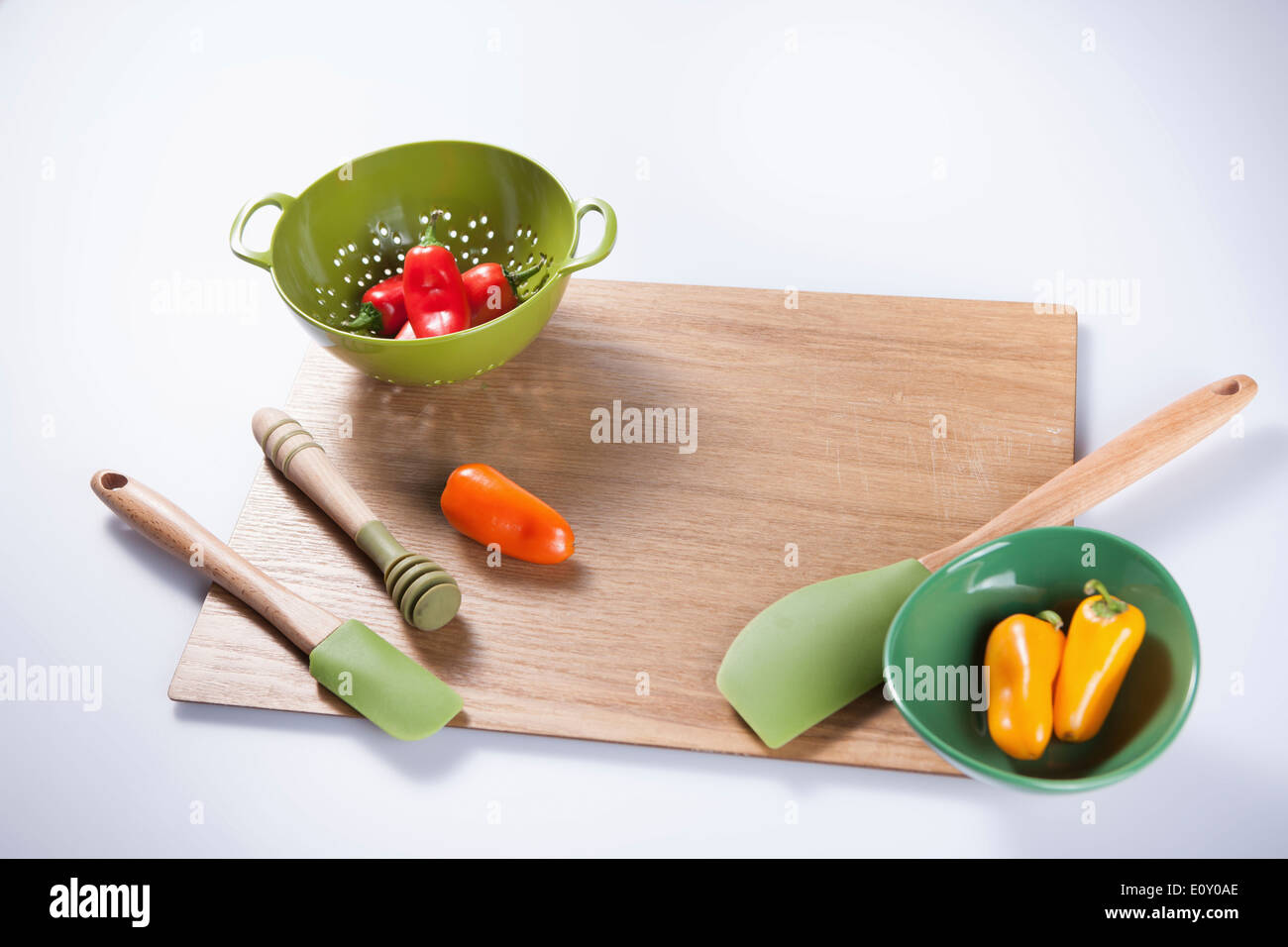 a cutting board with cooking tools Stock Photo - Alamy