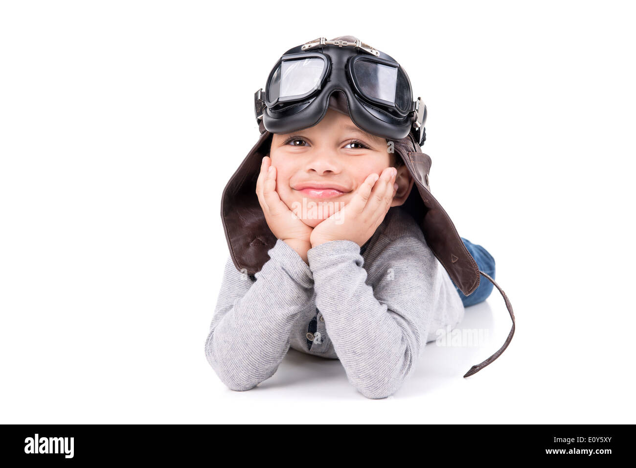 Young boy with pilot helmet isolated in white Stock Photo - Alamy