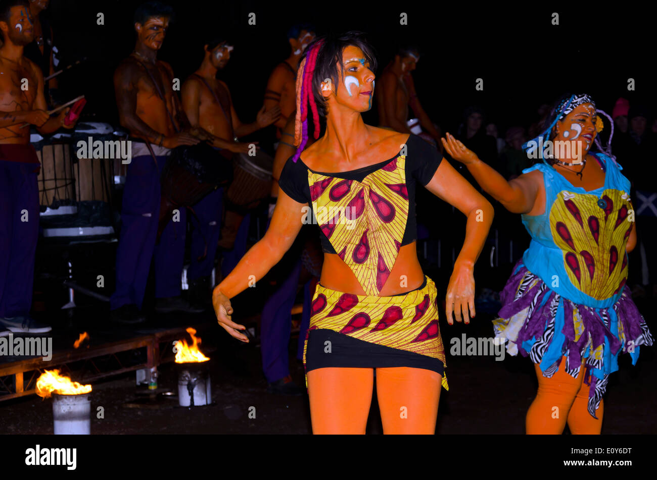 Female dancers and a drum band playing at the Beltane Fire Festival on ...