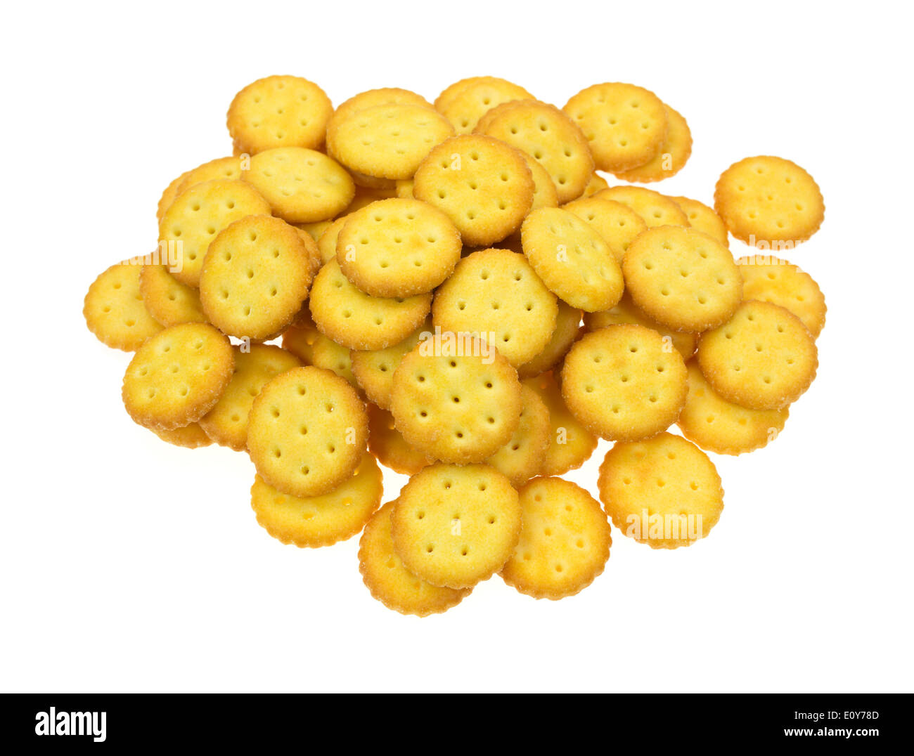A large serving of very small snack crackers atop a white background ...