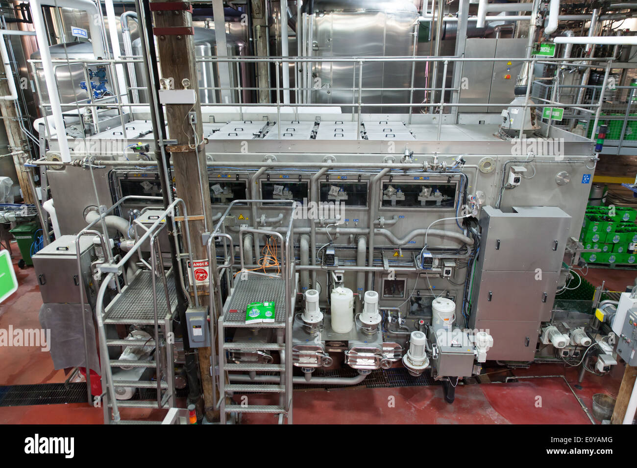 beer bottling line inside steam whistle brewery Stock Photo - Alamy