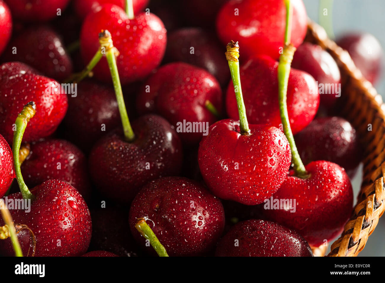 Raw Organic Red Cherries in a Basket Stock Photo - Alamy