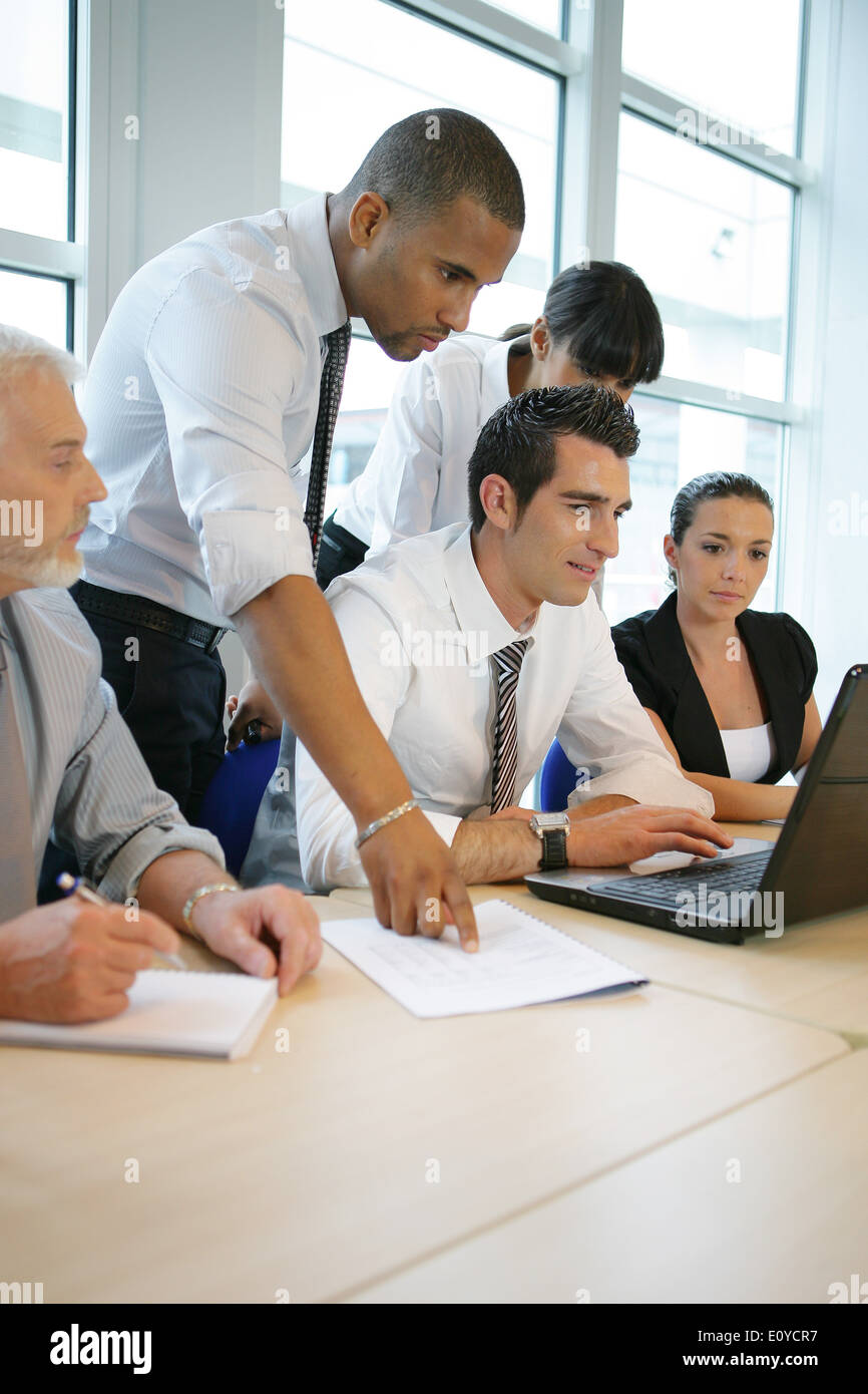 Co-workers working together on a project Stock Photo - Alamy