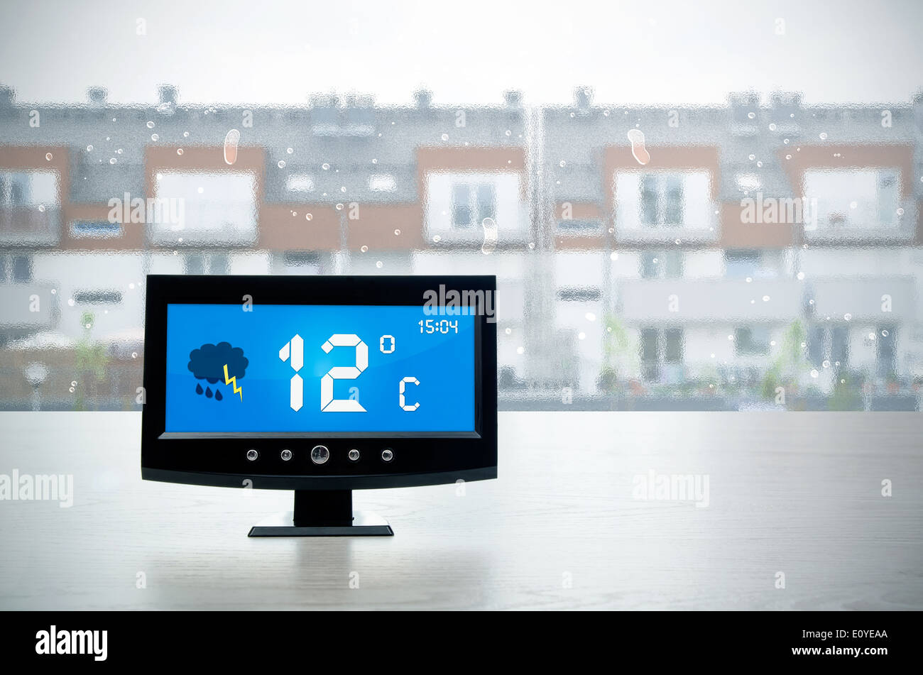 Weather station device with weather conditions outside background Stock ...