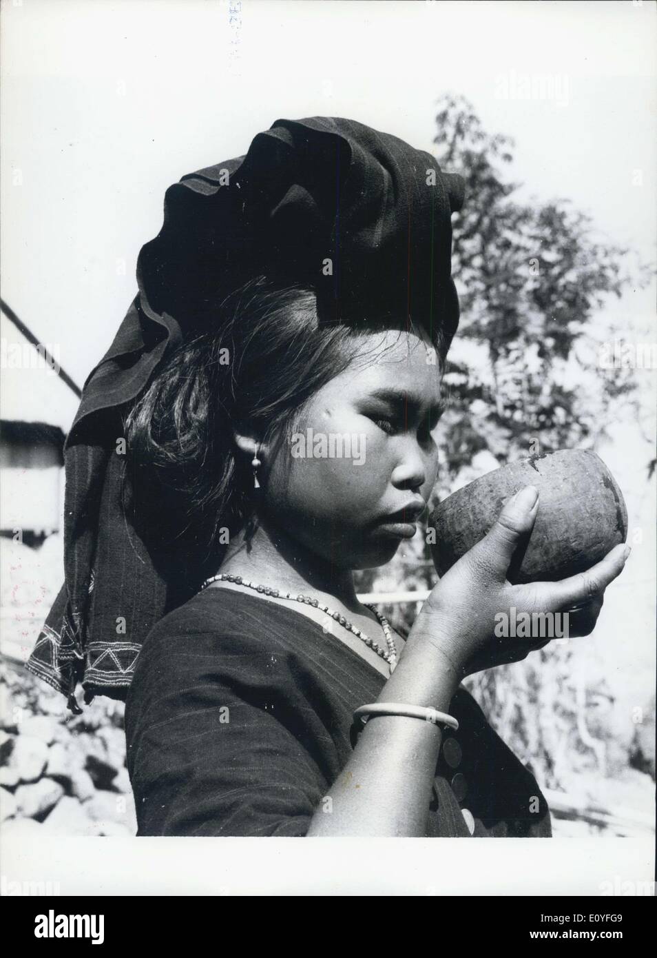 Jan. 1, 1970 - A girl from the Donggo tribe, wearing a black robe and a ...