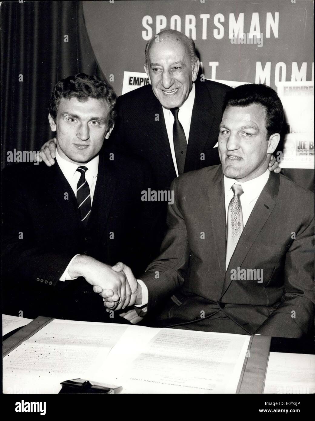 Apr. 23, 1970 - Signing contracts for Wembley fight. Photo shows Joe ...