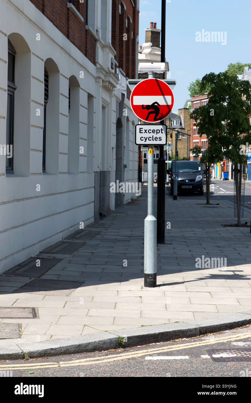 Graffiti on a No Entry street sign, Tabard Street, London, England, UK ...