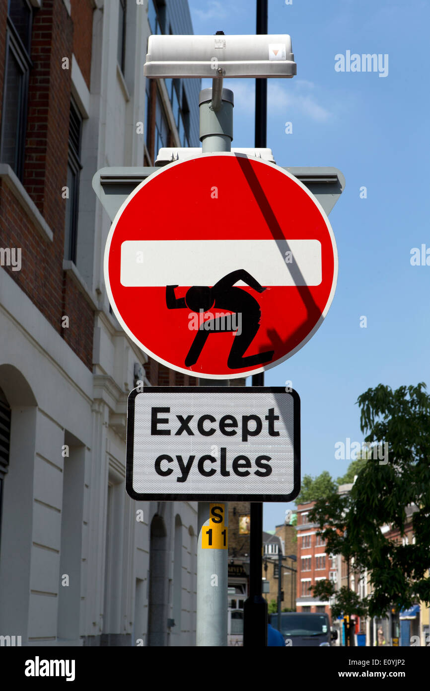 Graffiti on a No Entry street sign, Tabard Street, London, England, UK ...