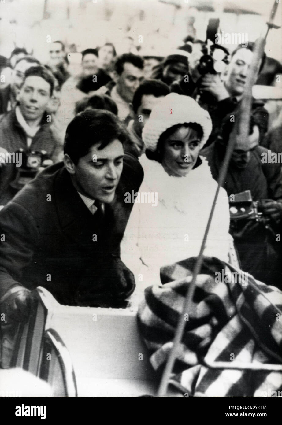 Singer Sacha Distel on holiday with woman Stock Photo - Alamy