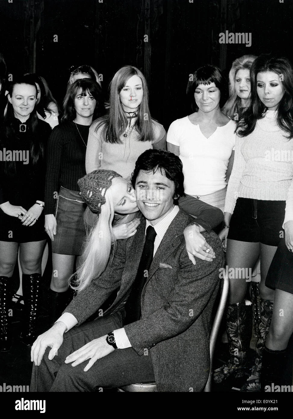 Singer Sacha Distel is kissed on cheek Stock Photo - Alamy