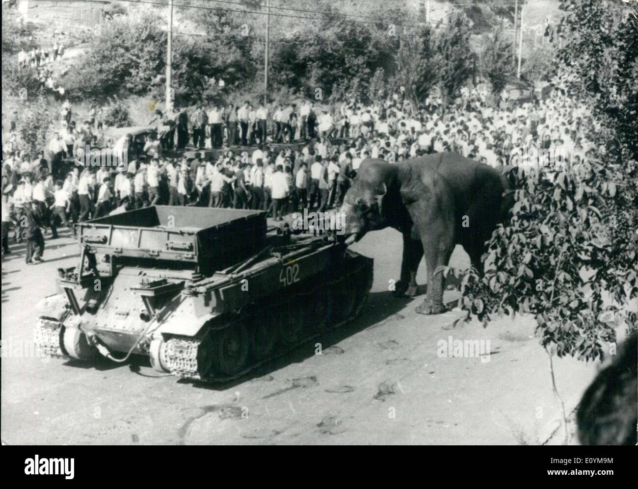 Sep. 24, 1970 - An elephant pushing a tractor at zoo of D'Erivan Stock ...