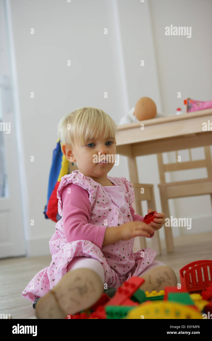 A toddler playing Stock Photo - Alamy