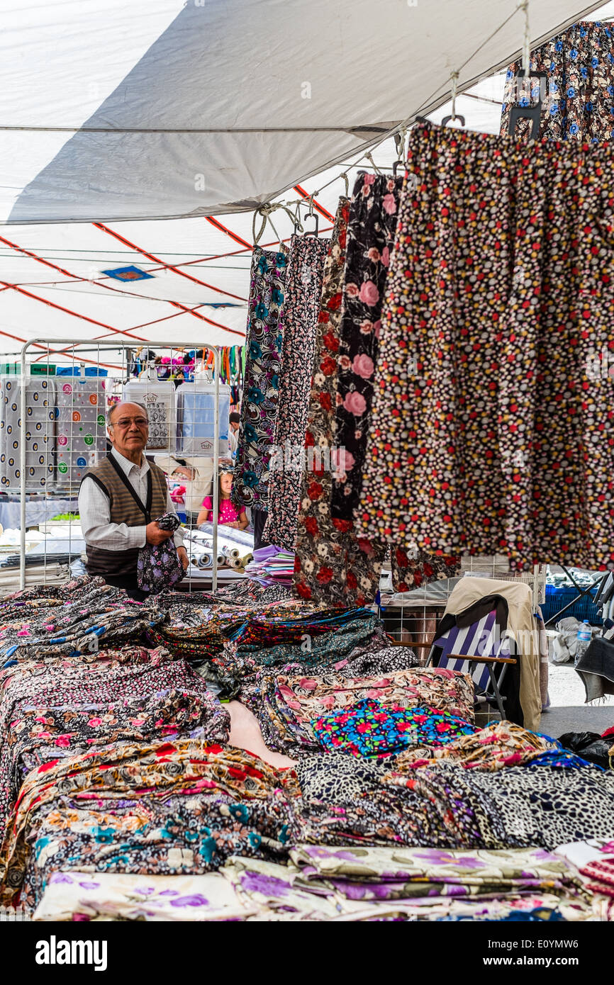 The weekly Tuesday market in Foca, Izmir District, Turkey, stall holder ...