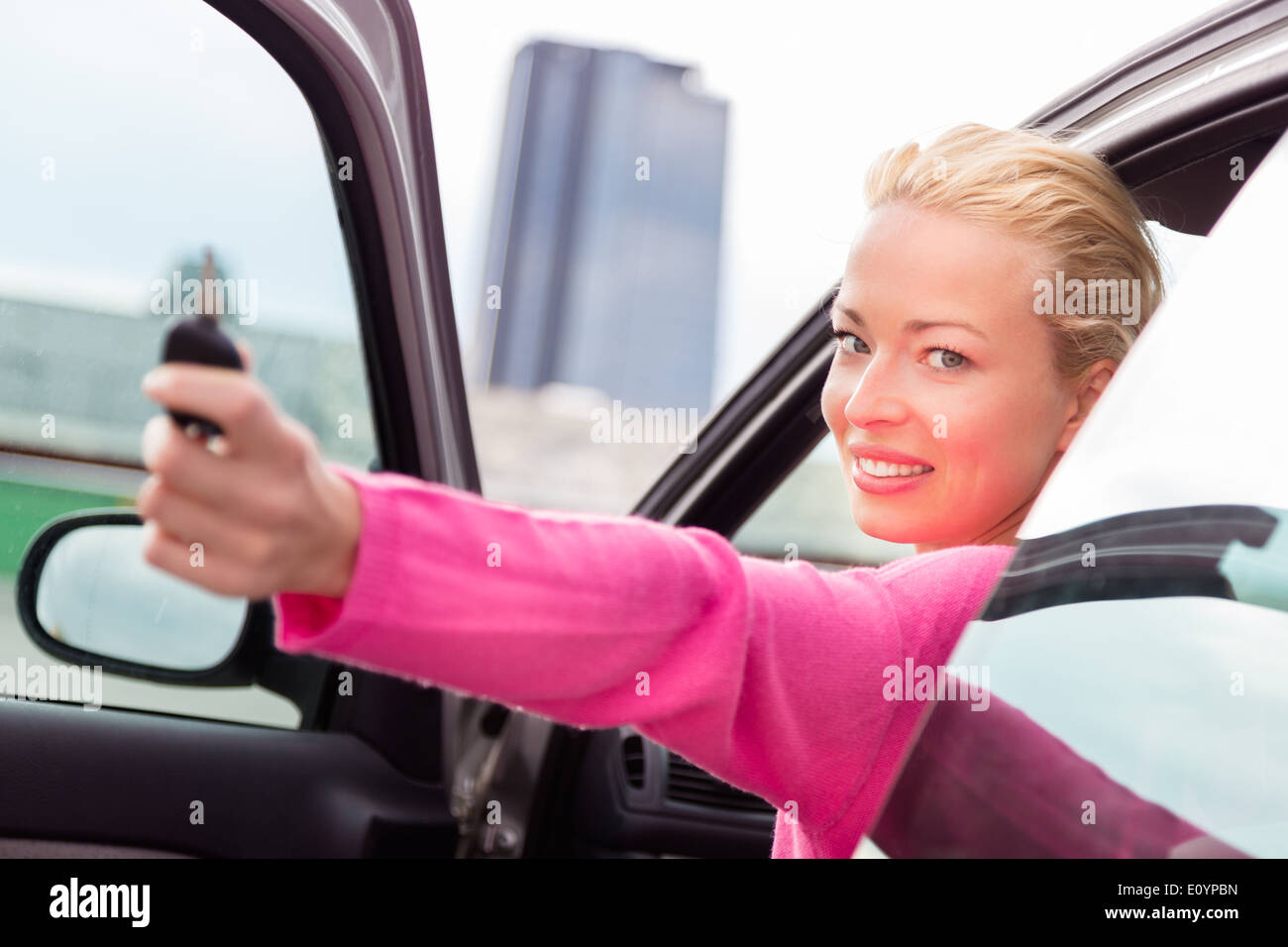 Woman driver showing car keys Stock Photo - Alamy