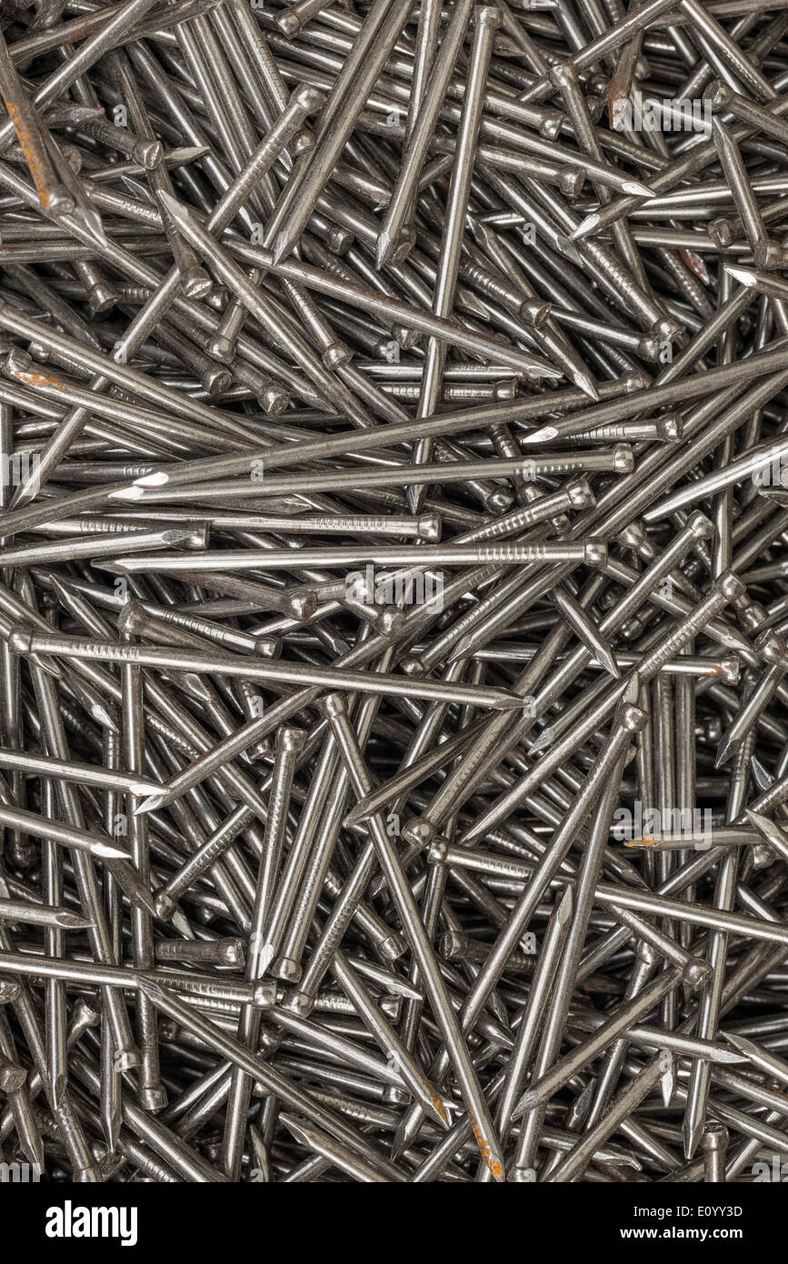 Close up of a pile of nails in a plane Stock Photo - Alamy