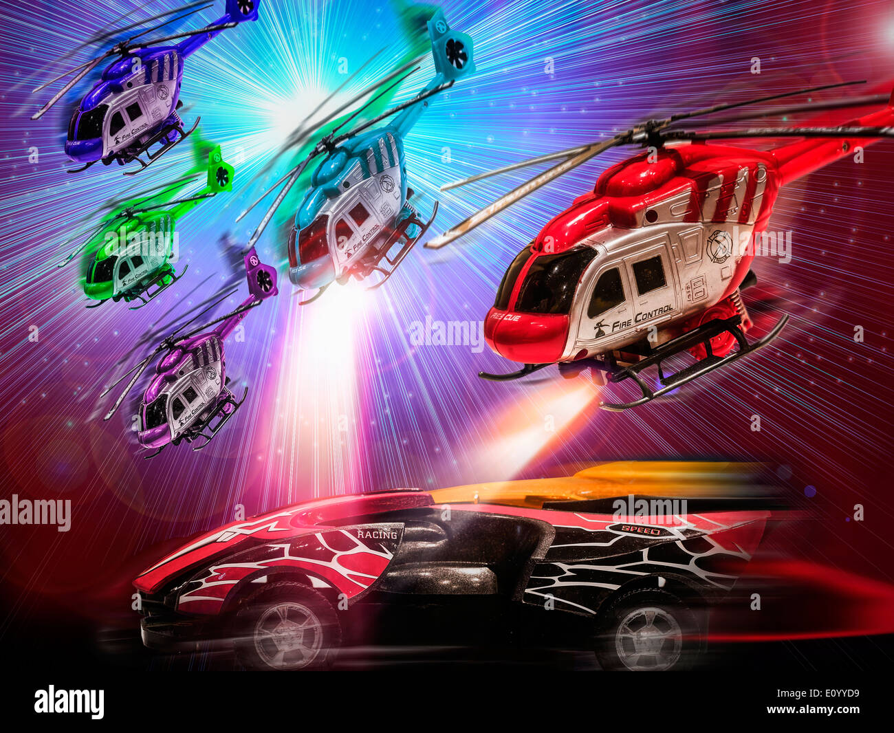 Toy Helicopters Chasing a Toy Car Stock Photo - Alamy