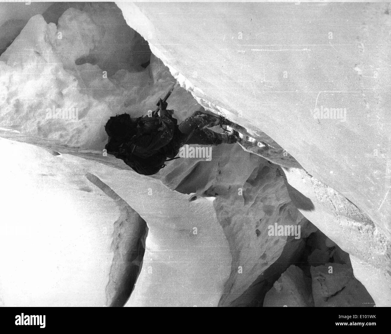 Climbing a mountain snow Black and White Stock Photos & Images - Alamy