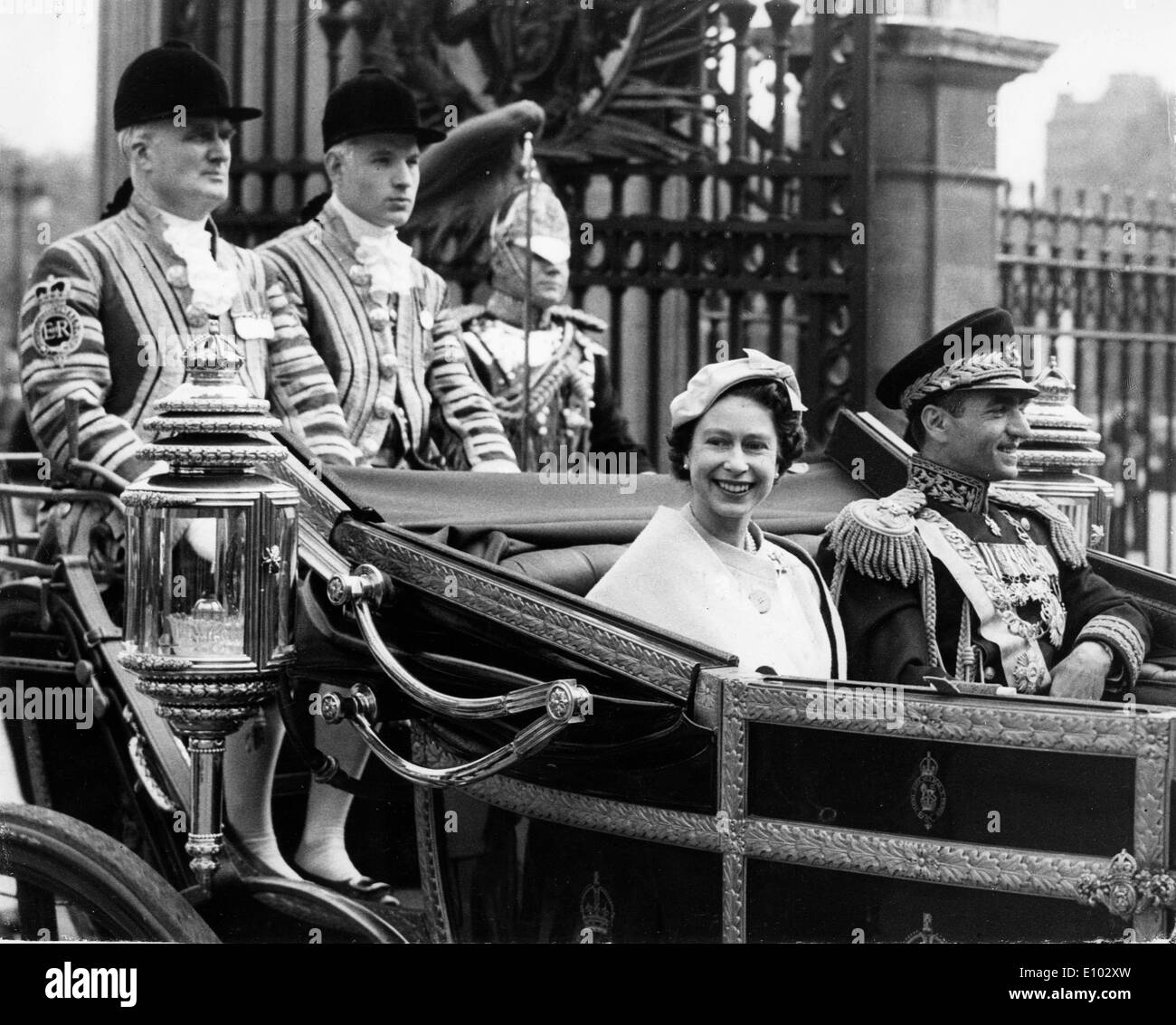 Queen Elizabeth II and Prince Philip ride in carriage Stock Photo - Alamy