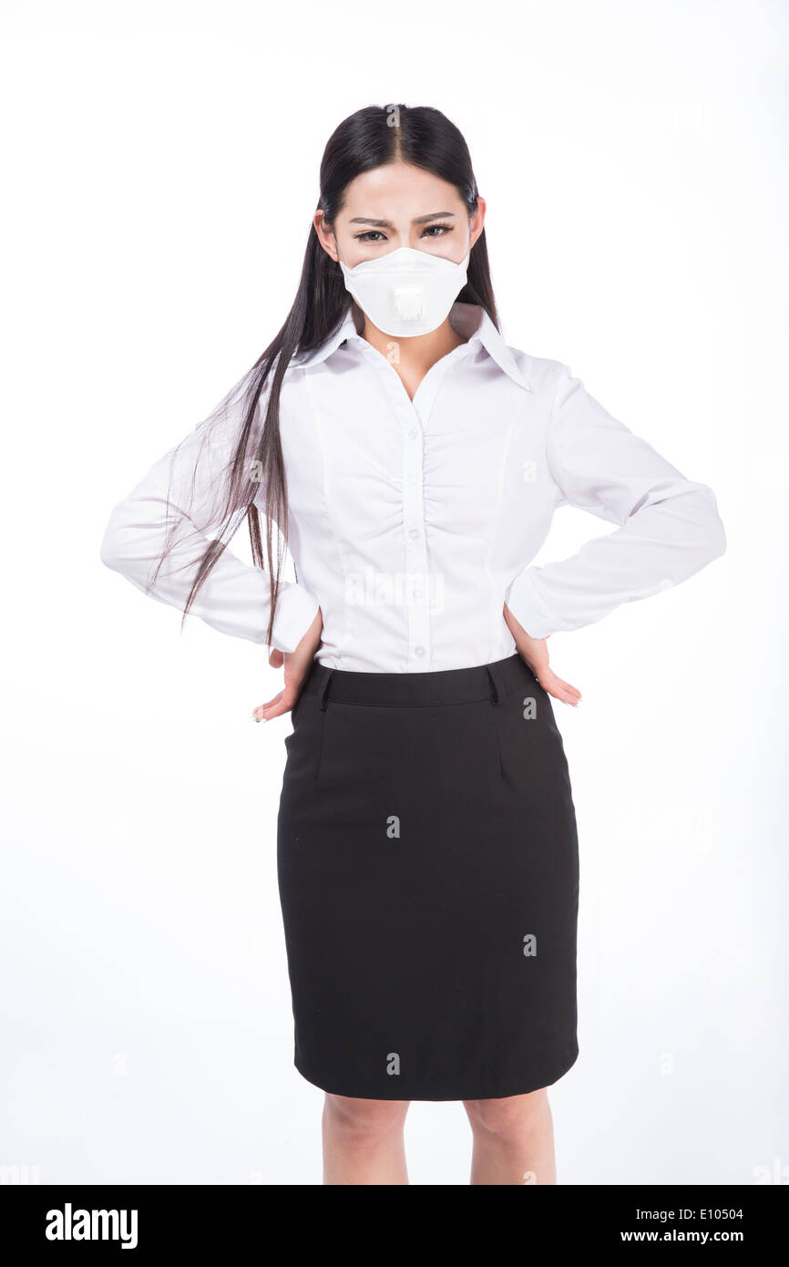 black hair girl with a mask on her face. Isolated on white Stock Photo ...