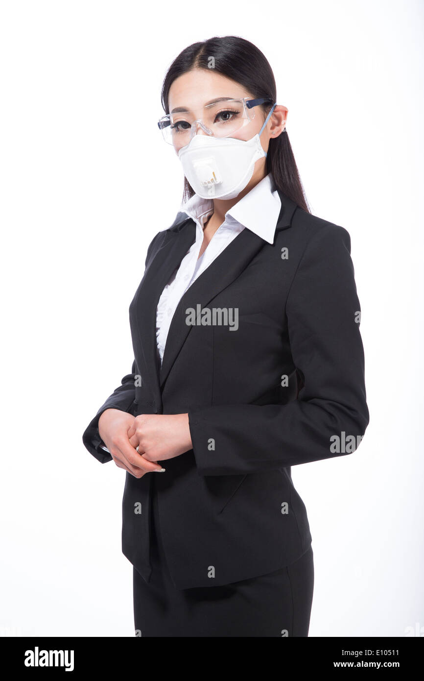 black hair girl with a mask on her face. Isolated on white Stock Photo ...