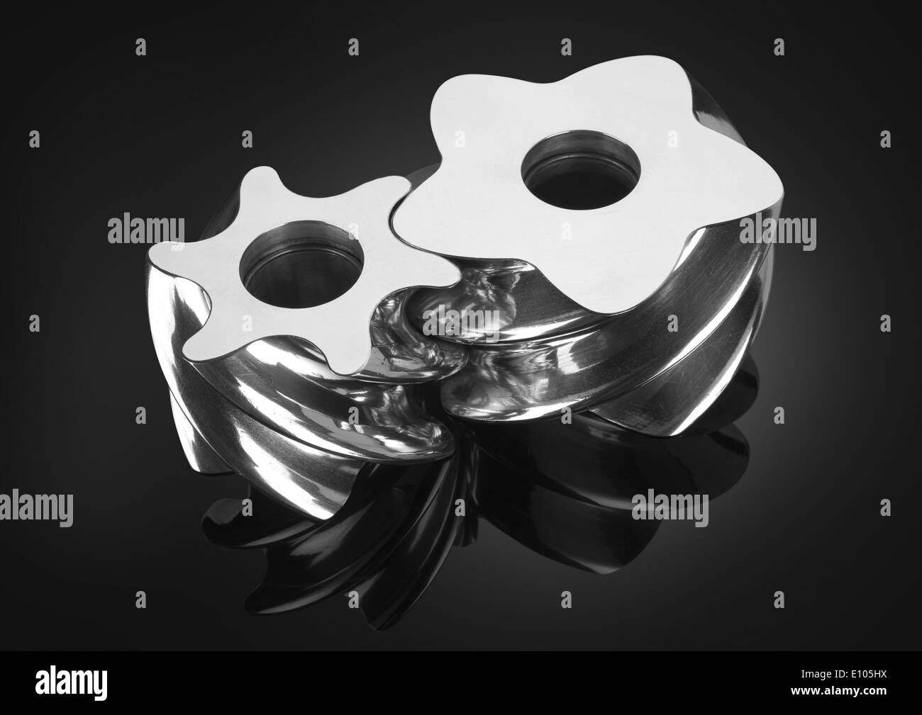 Screw compressor part on a black reflective acrylic background Stock ...