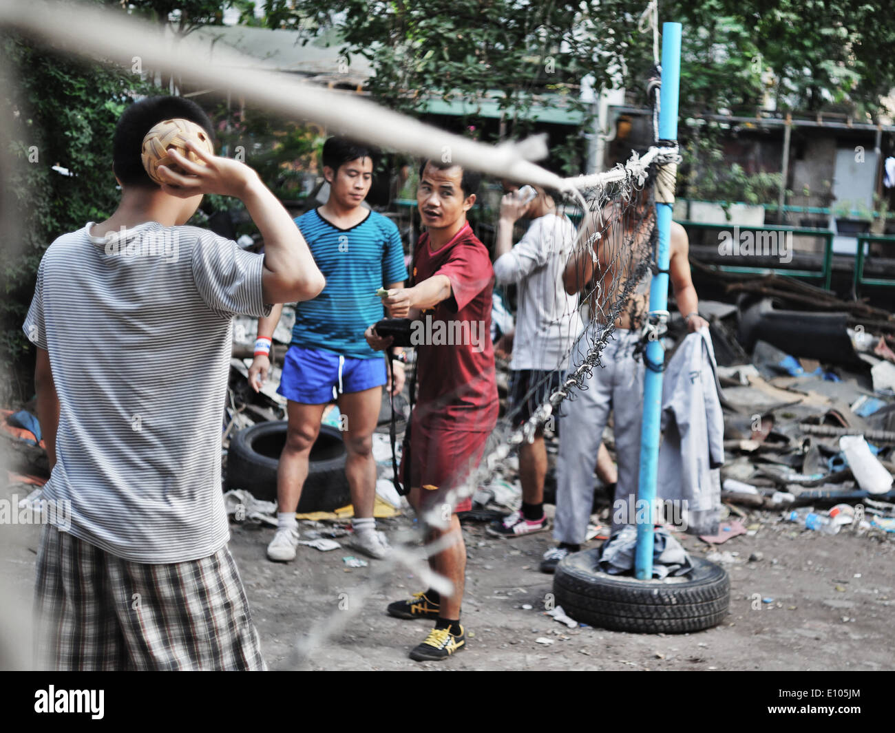 Men playing takraw in Bangkok, Thailand Stock Photo - Alamy
