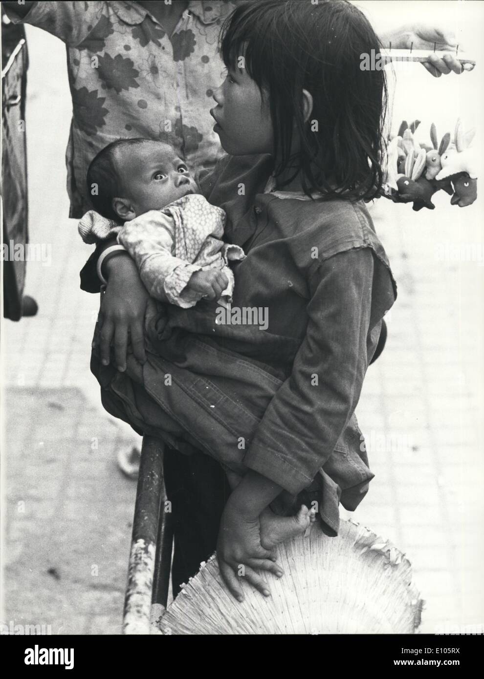 1970 child begging in saigon hi-res stock photography and images - Alamy