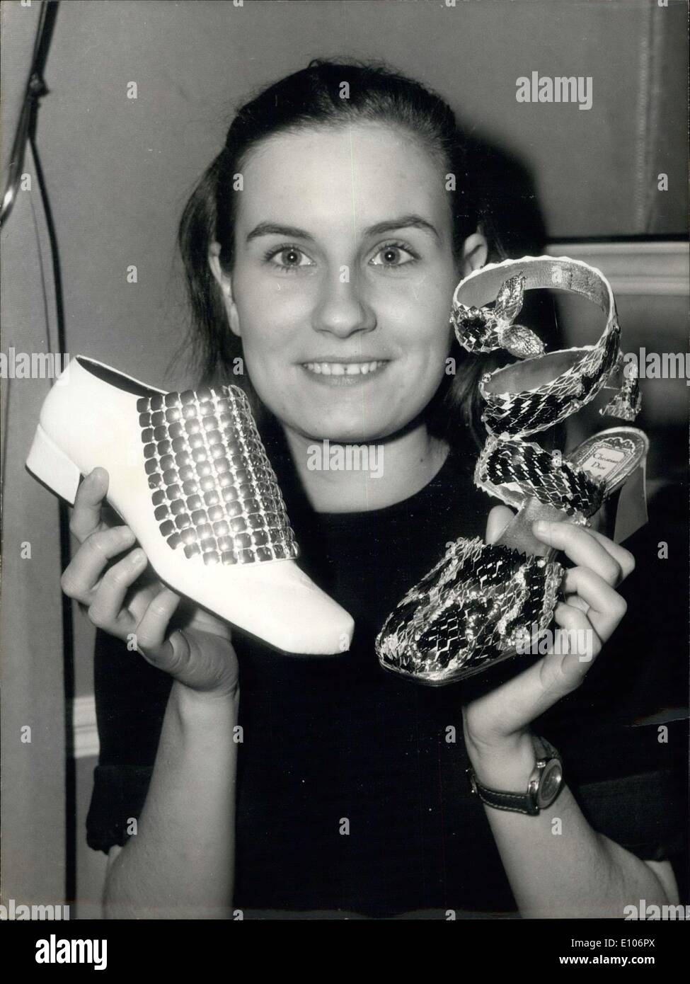 Jan. 28, 1970 - Model Holds Up Two Christian Dior Spring-Summer Shoes ...