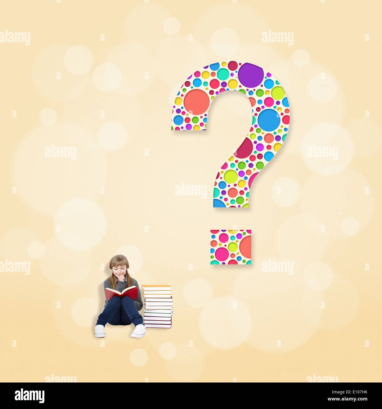 a girl reading next to a question mark Stock Photo - Alamy