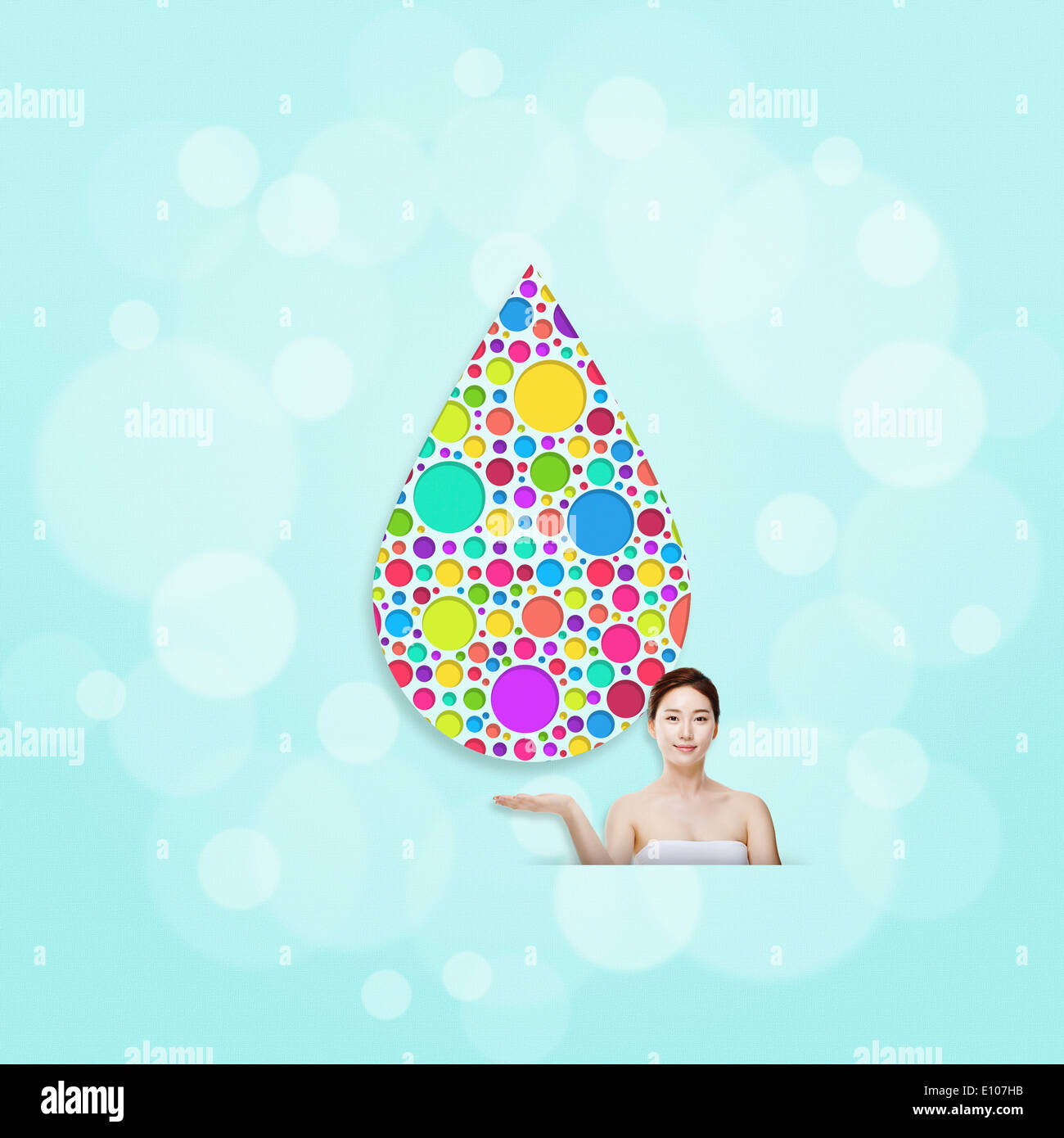 a woman standing next to a water drop Stock Photo - Alamy