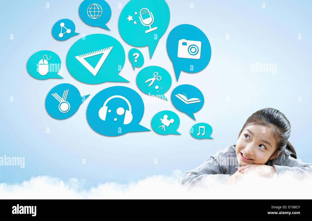 a girl lying next to a set of icons Stock Photo - Alamy