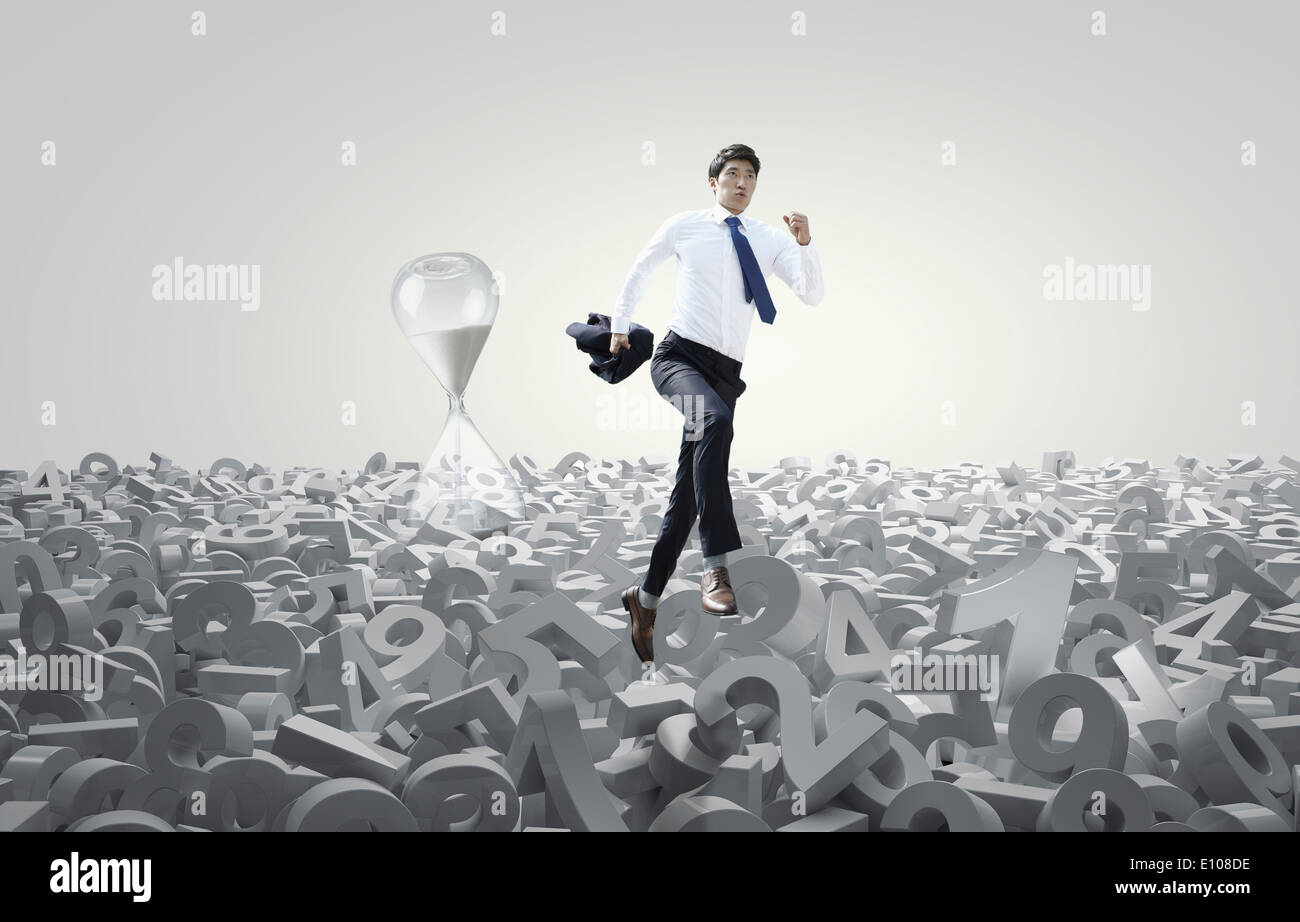 Businessman looking up at numbers hi-res stock photography and images ...
