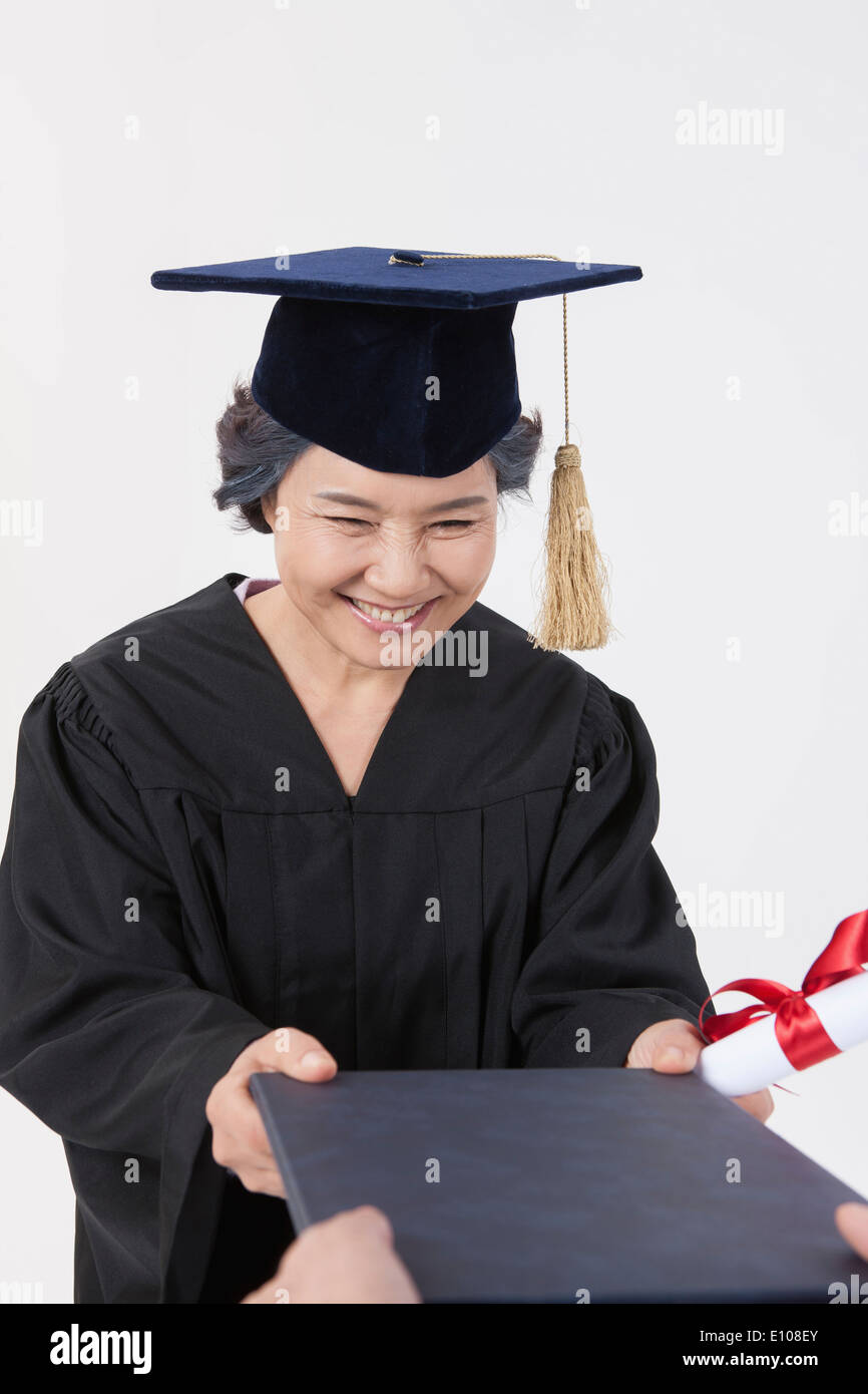 Receiving diploma hi-res stock photography and images - Alamy