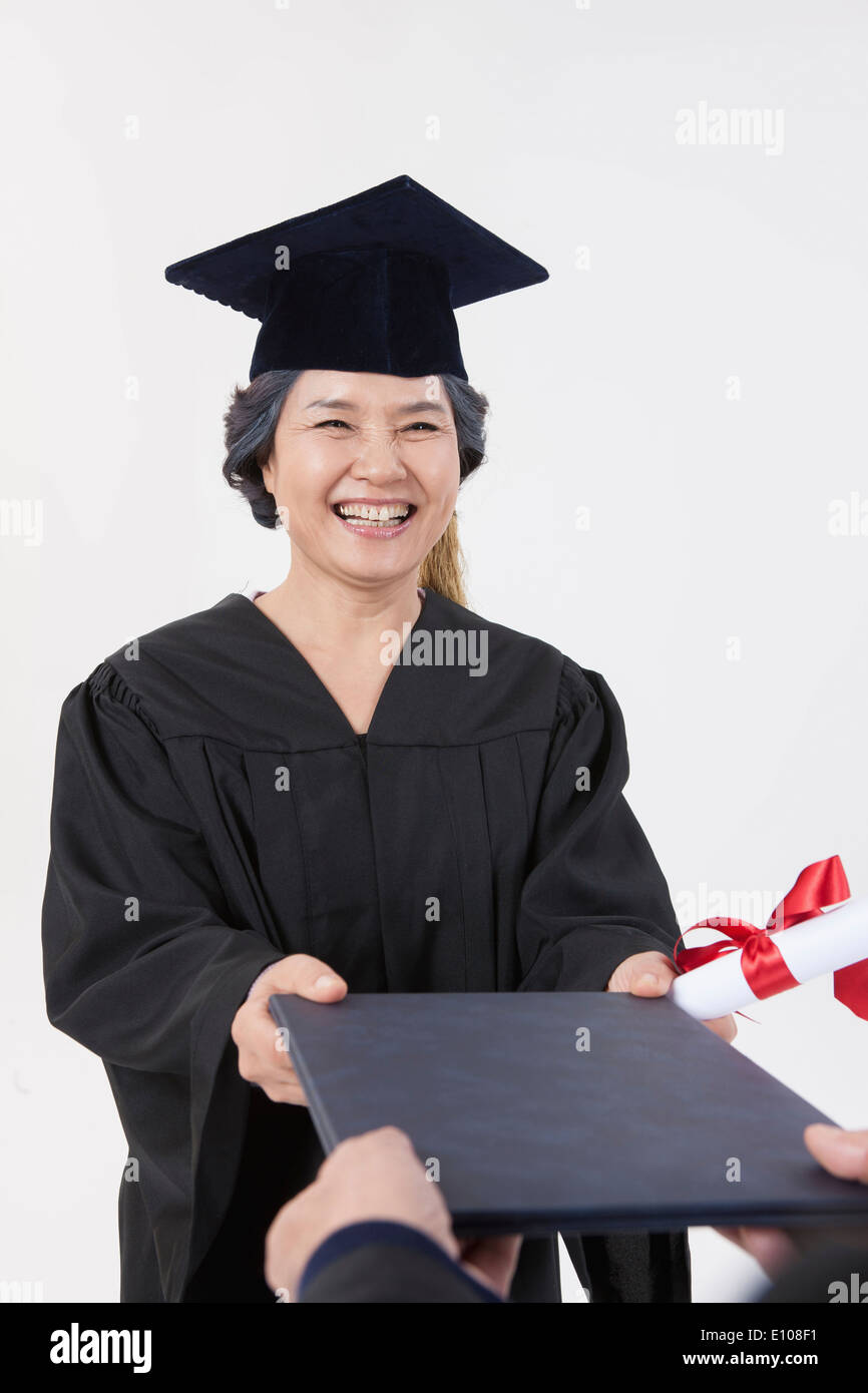 Receiving diploma hi-res stock photography and images - Alamy