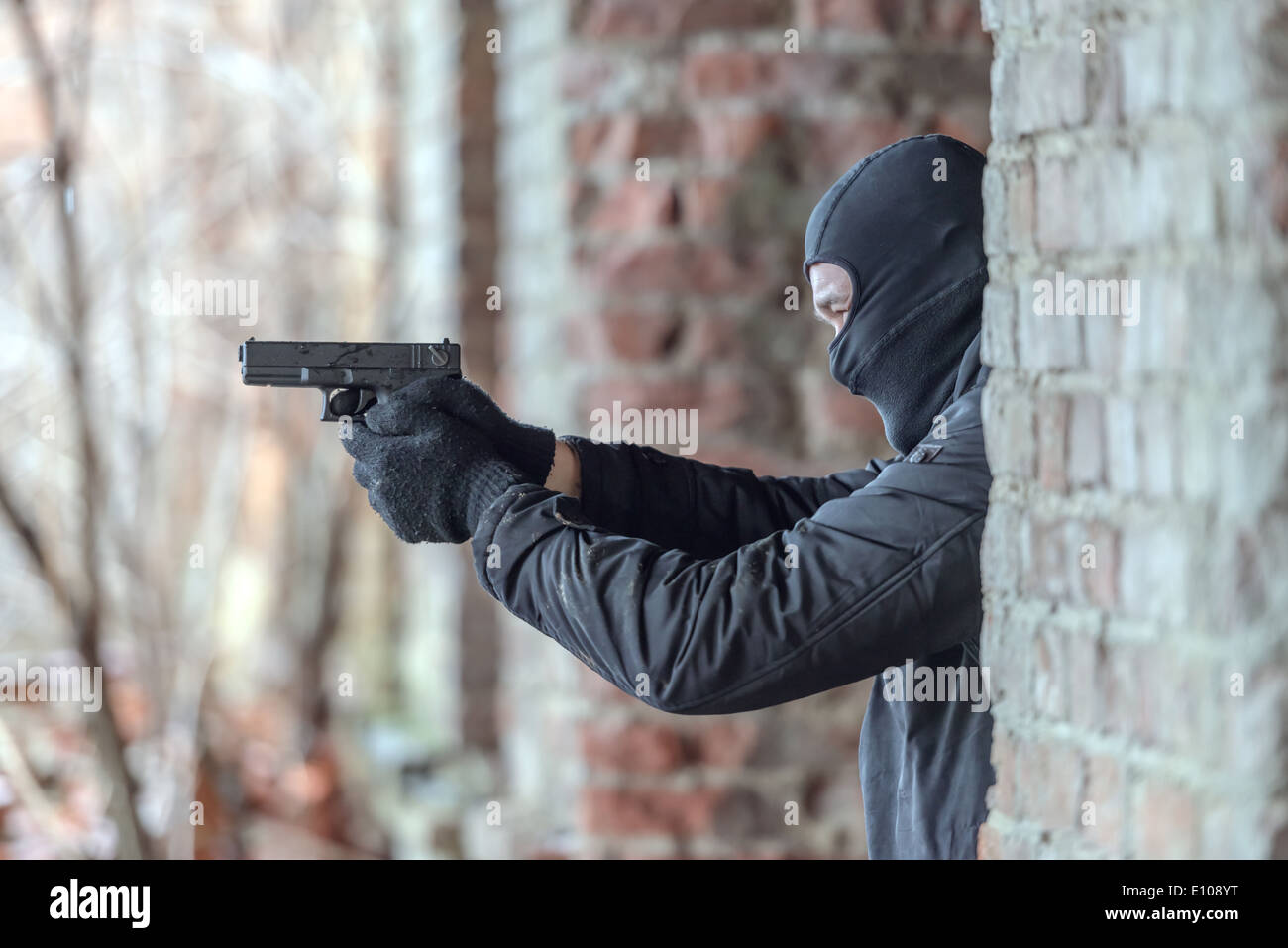 Gun man mask hi-res stock photography and images - Alamy
