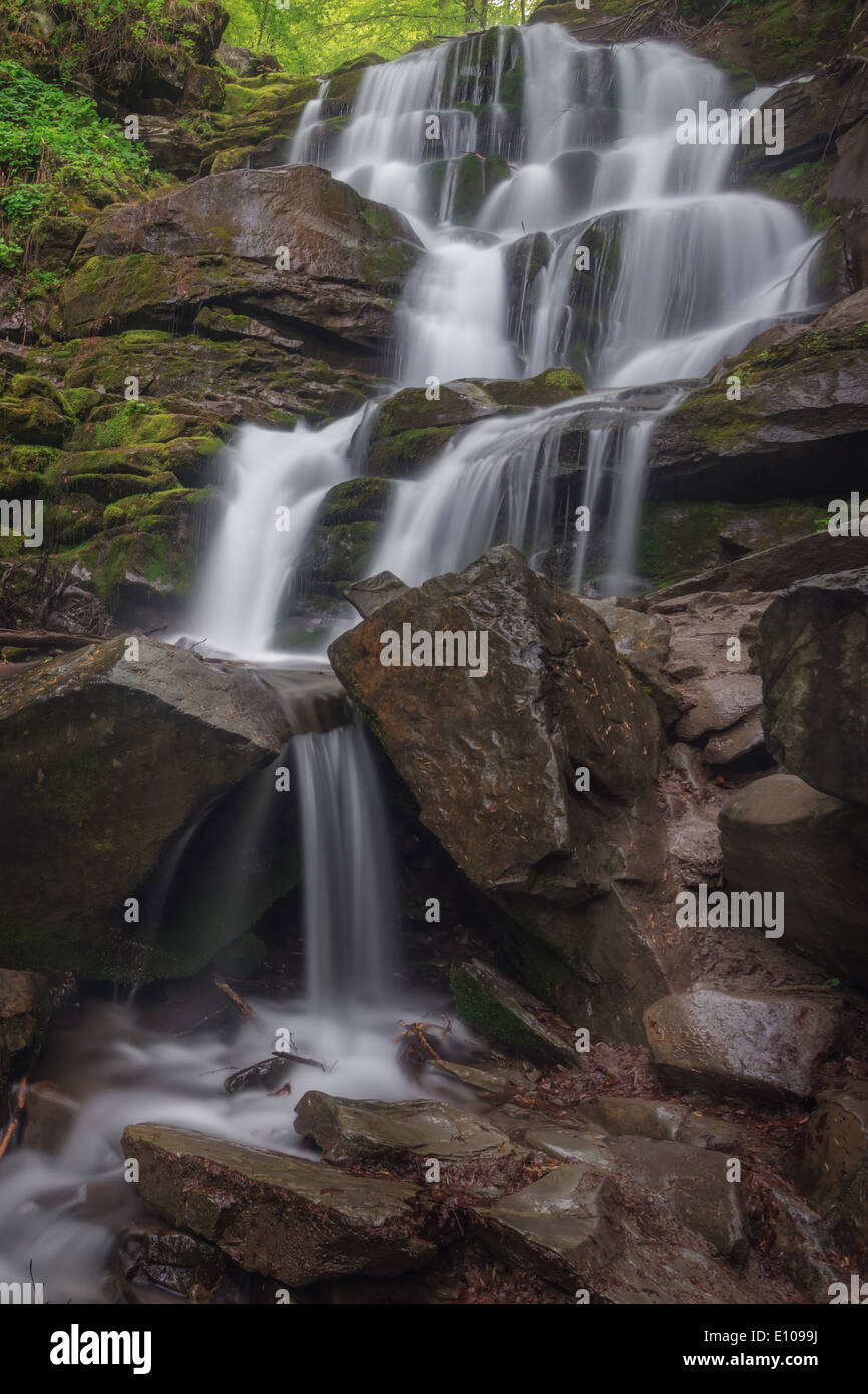 waterfall on mountain in summer time Stock Photo - Alamy
