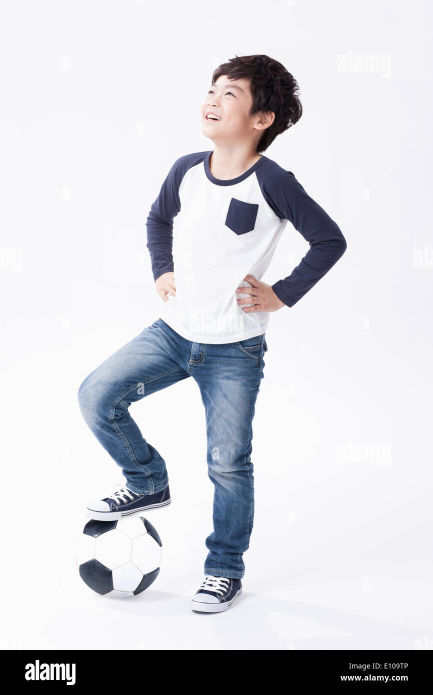 Cut out of a boy with football hi-res stock photography and images - Alamy