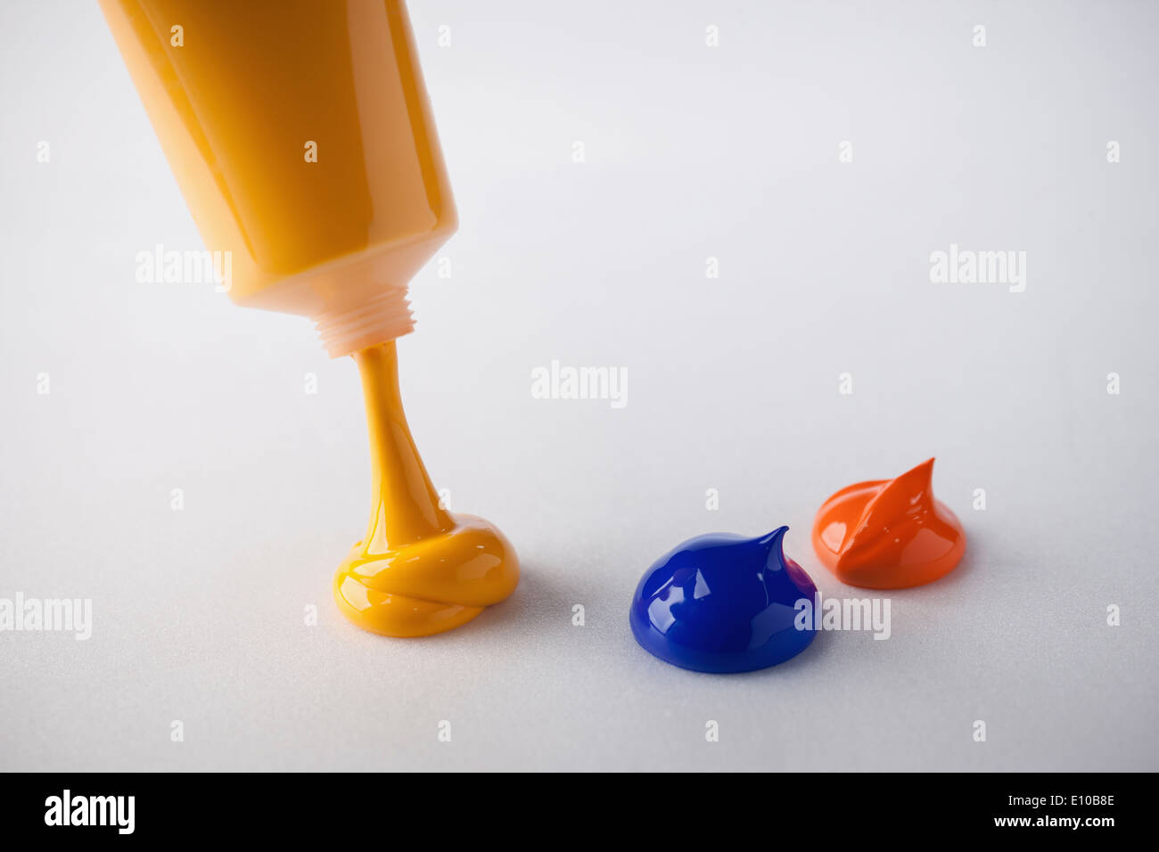 piles of different color paints Stock Photo - Alamy