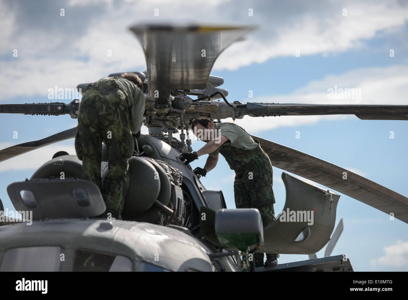 Mechanic on a helicopter rotor - ILA 2014 - 19.05.2014. Photo: picture ...