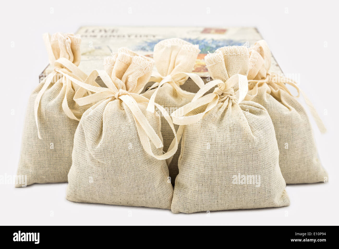 Textile sachet pouches with gift box on white background Stock Photo ...
