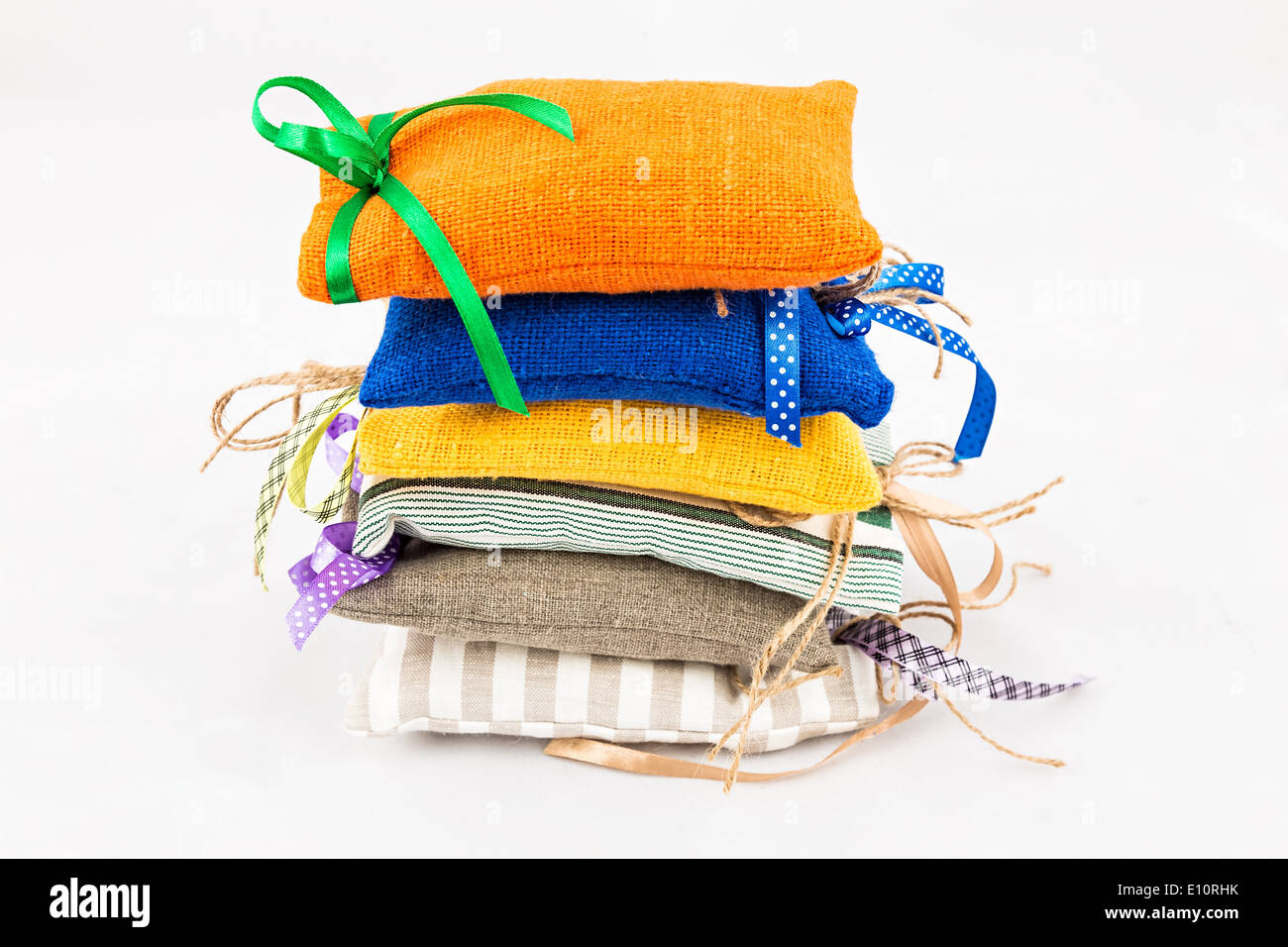 Decorative textile sachet pouches on white background Stock Photo - Alamy